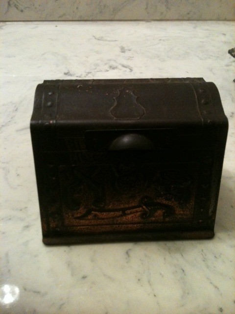 Opening an Antique Coin Bank | ThriftyFun