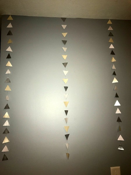 Making Colored Paper Triangle Wall Decor | ThriftyFun