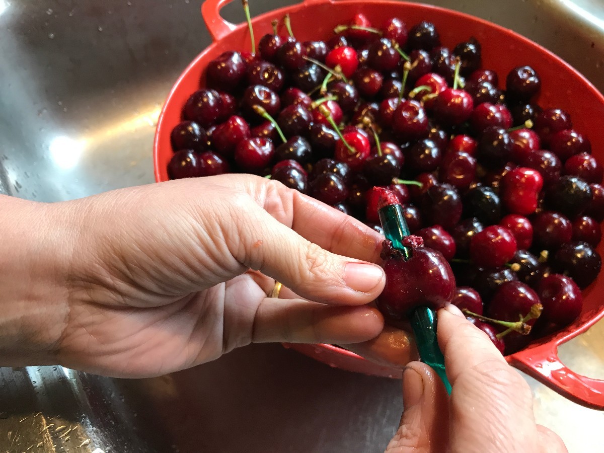 Using a Straw to Pit Cherries | ThriftyFun