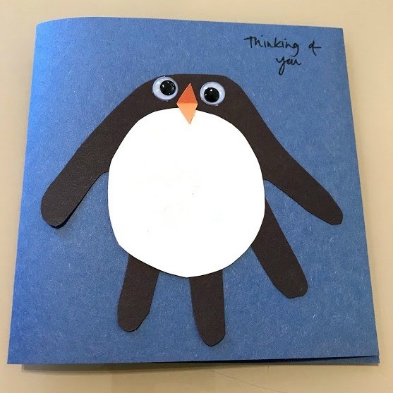 Making a Penguin Handprint Card | ThriftyFun