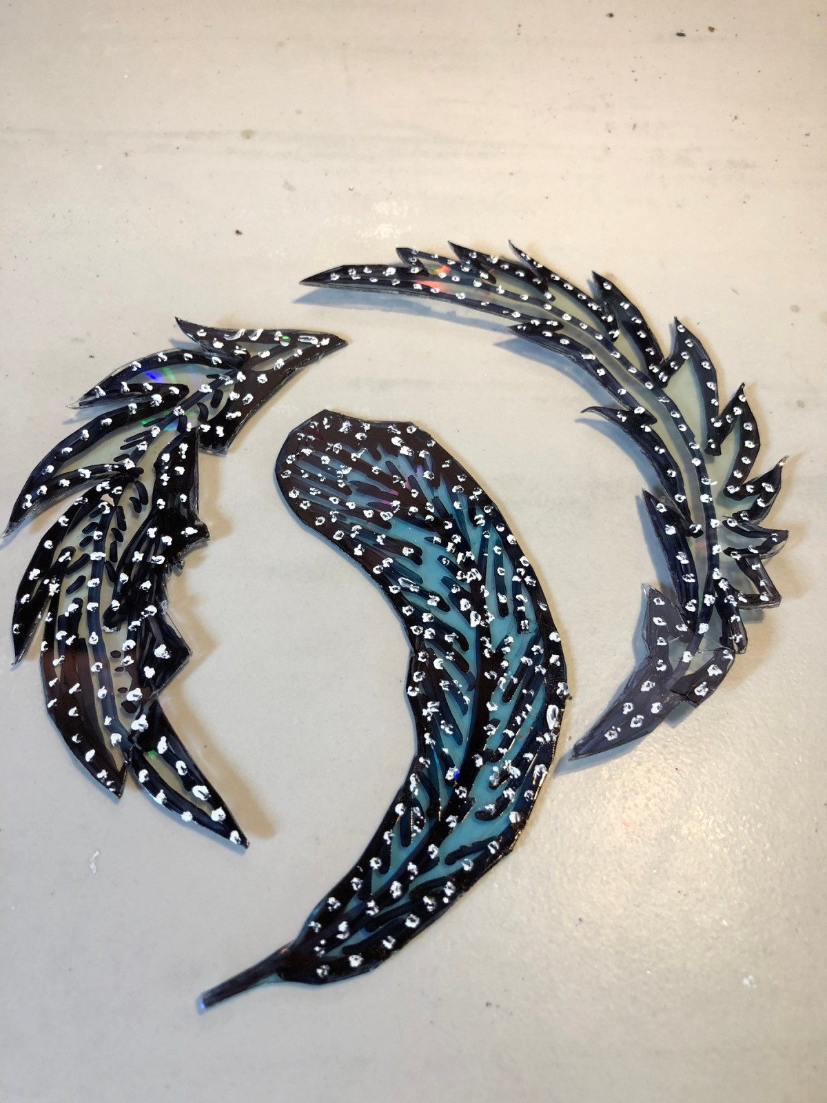 Making Feather Bookmarks from CDs | ThriftyFun