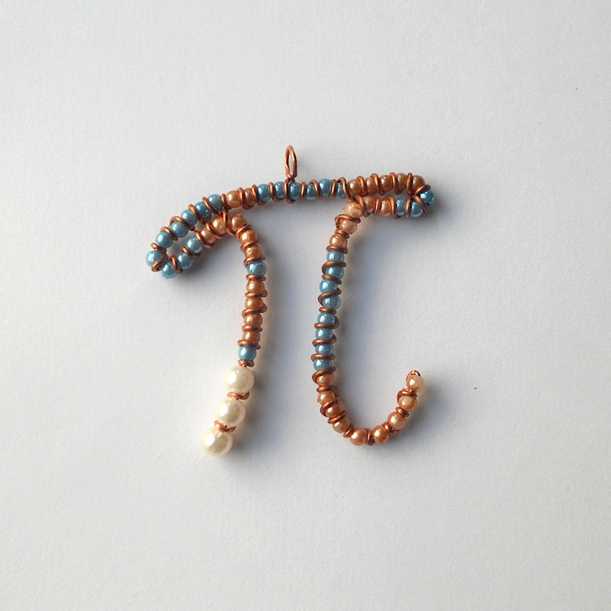 Wire Wrapped and Beaded Pi Pendant | ThriftyFun